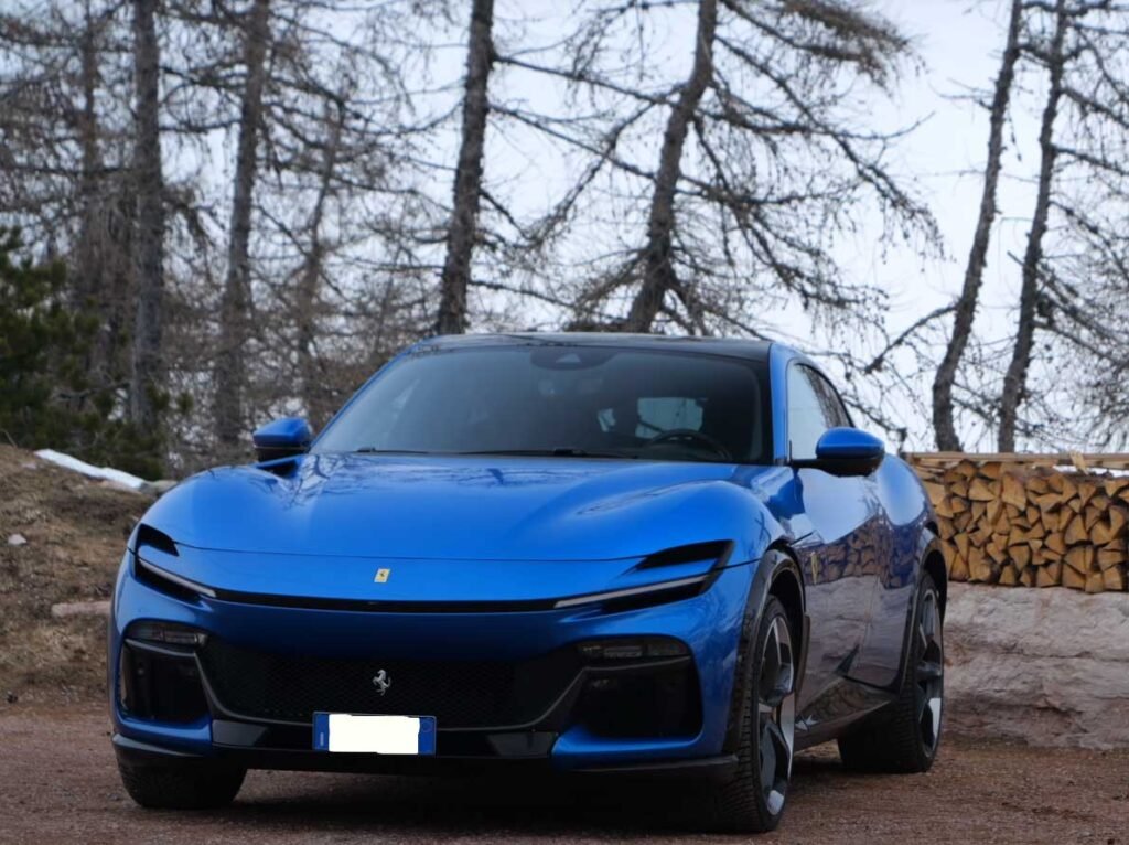 Ferrari has revealed its first production 4-door car - Thereviewstories